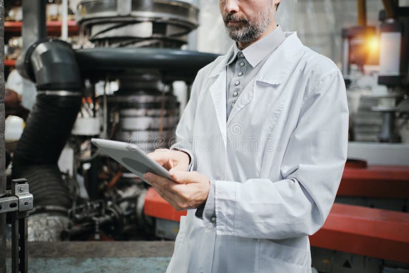 Engineer with Tablet Working at Polymer Factory Stock Image - Image of ...