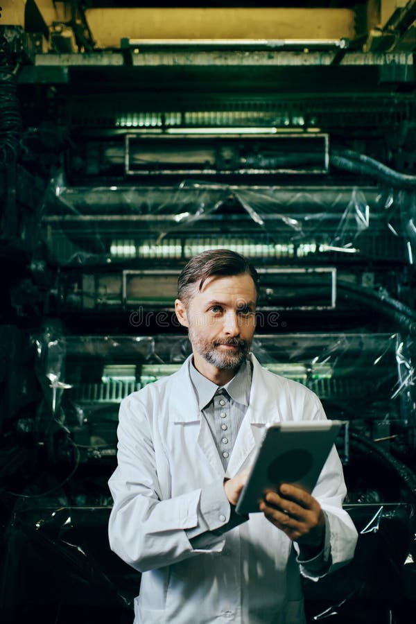 Engineer with Tablet Working at Polymer Factory Stock Image - Image of ...