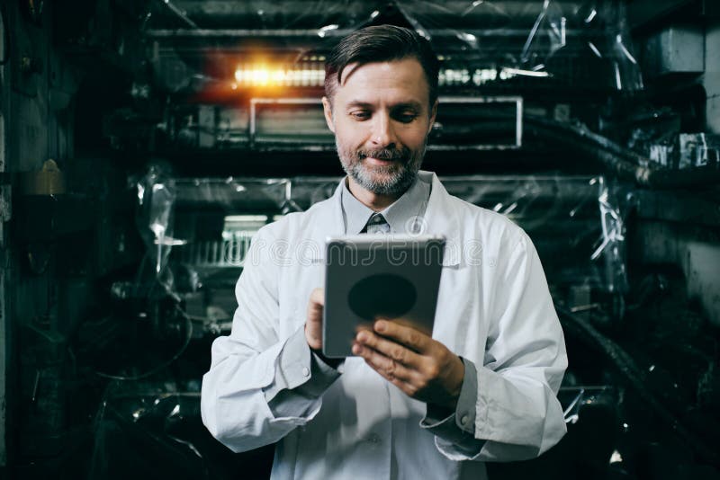 Engineer with Tablet Working at Polymer Factory Stock Image - Image of ...