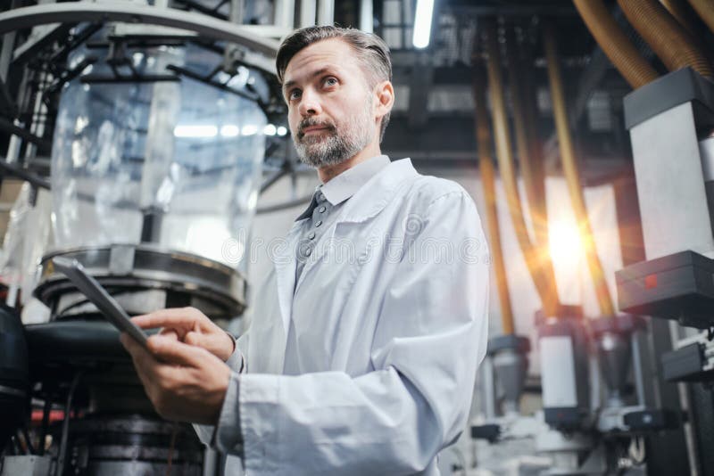 Engineer with Tablet Working at Polymer Factory Stock Image - Image of ...