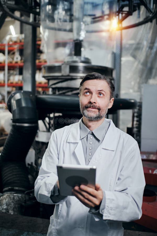 Engineer with Tablet Working at Polymer Factory Stock Image - Image of ...