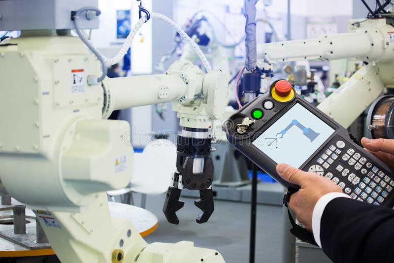 Engineer with Teach Pendant Device. Stock Image - Image of machine ...