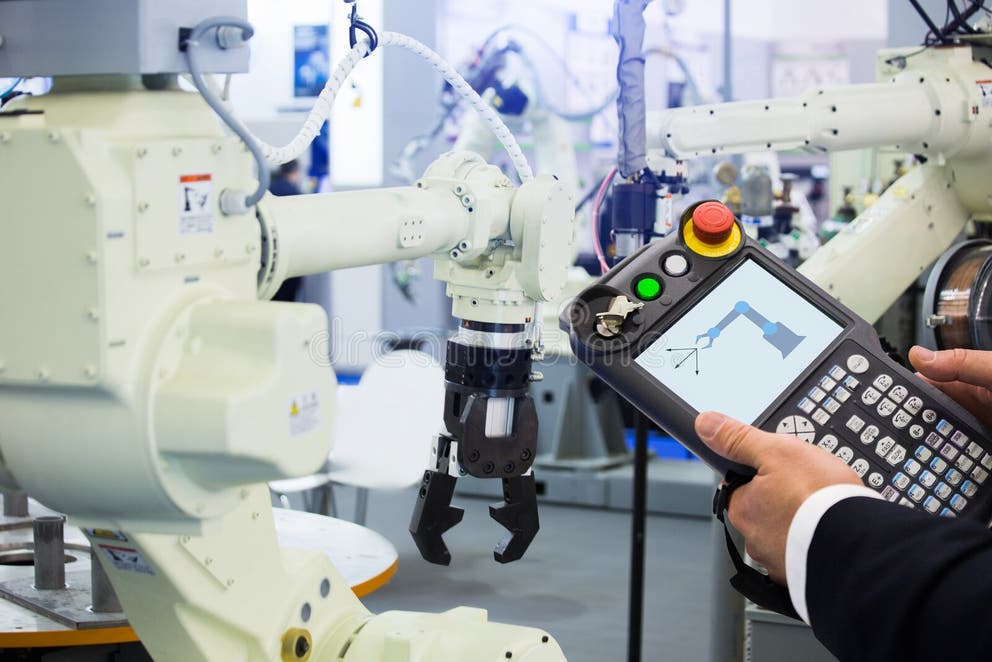 Engineer with Teach Pendant Device. Stock Image - Image of machine ...