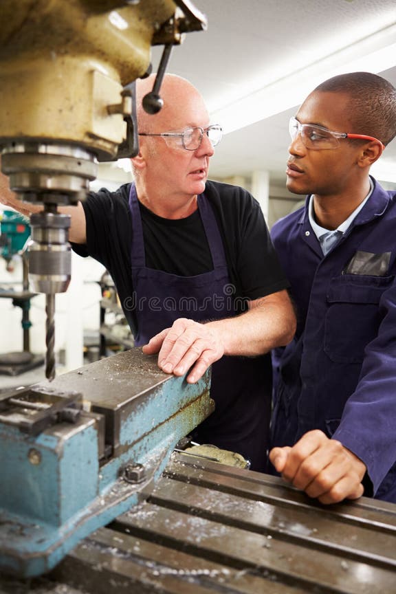 Engineer Teaching Apprentice To Use Milling Machine Stock Image - Image ...