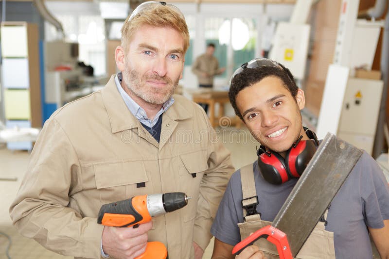 Engineer Teaching Apprentices with Machines Stock Photo - Image of ...