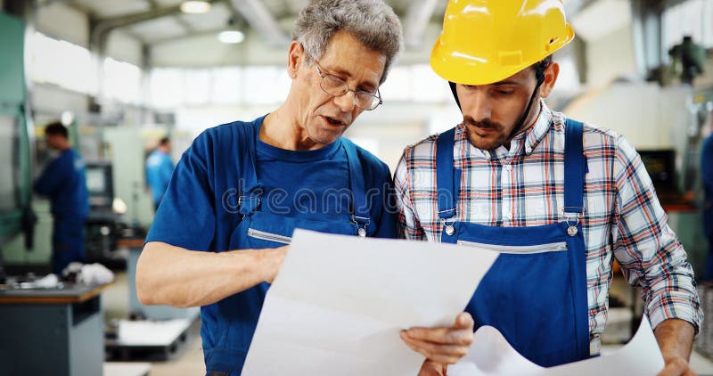 Engineer Teaching Apprentices To Use Computerized Lathe Stock Photo ...
