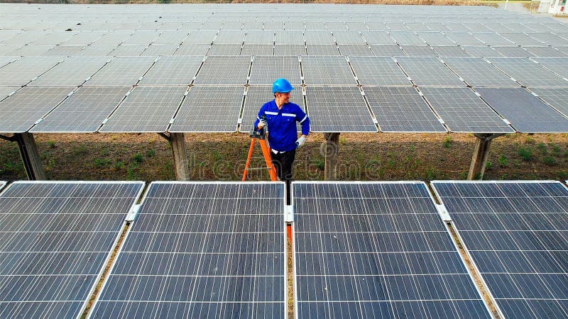 Engineer Team Checking and Maintaining Solar Panels on Solar Power ...