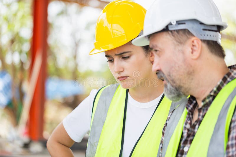 Senior Engineer and Female Foreman Team Checking Project at Precast ...