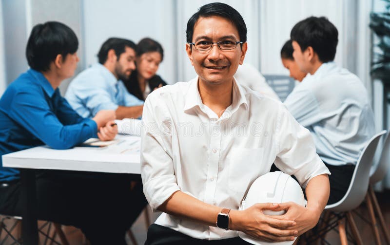 Diverse Group of Civil Engineer and Client Working on Architect ...