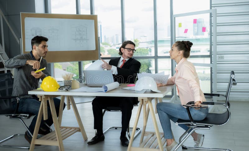 Engineer Team is Meeting To Inspect the Construction Blueprint Drawings ...