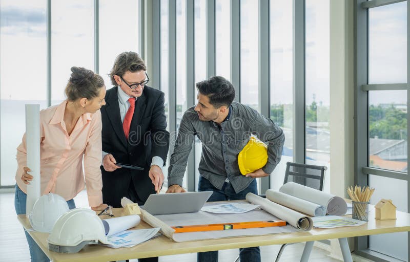 Engineer Team is Meeting To Inspect the Construction Blueprint Drawings ...