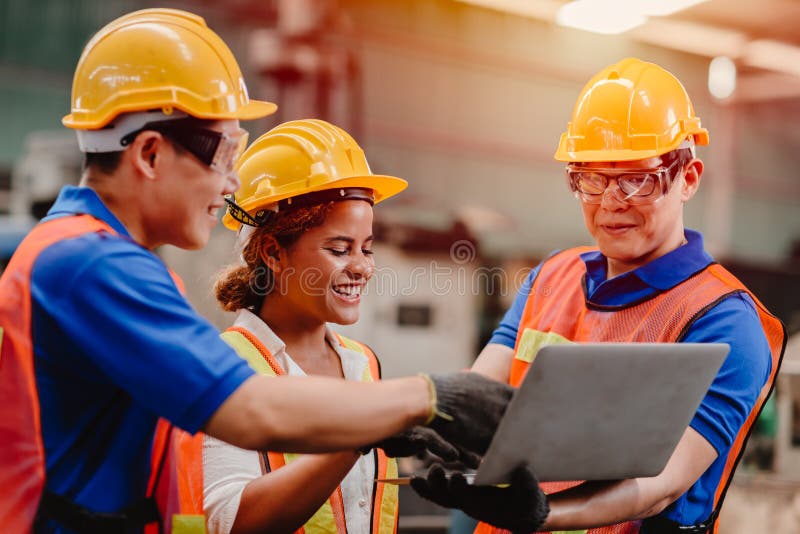 Engineer Team Mix Race Working Together in Heavy Industry with Laptop ...