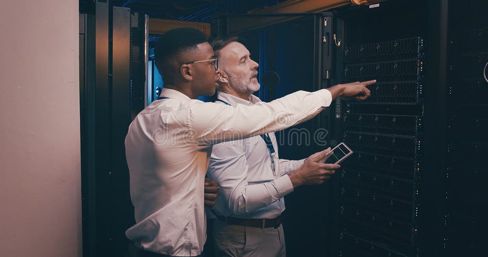 Engineer, Team or Tablet with Pointing in Server Room for Software ...