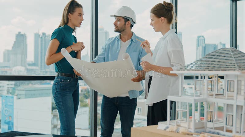 Engineer Team Talk about Design while Manager Hold at Project Plan ...