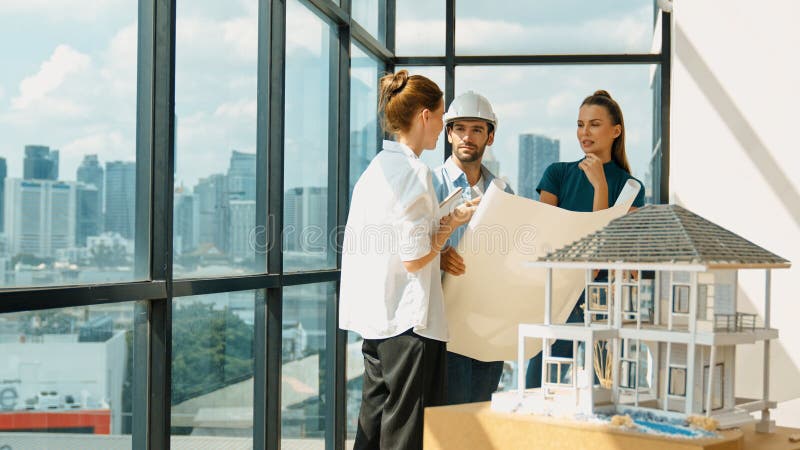 Engineer Team Talk about Design while Manager Hold at Project Plan ...