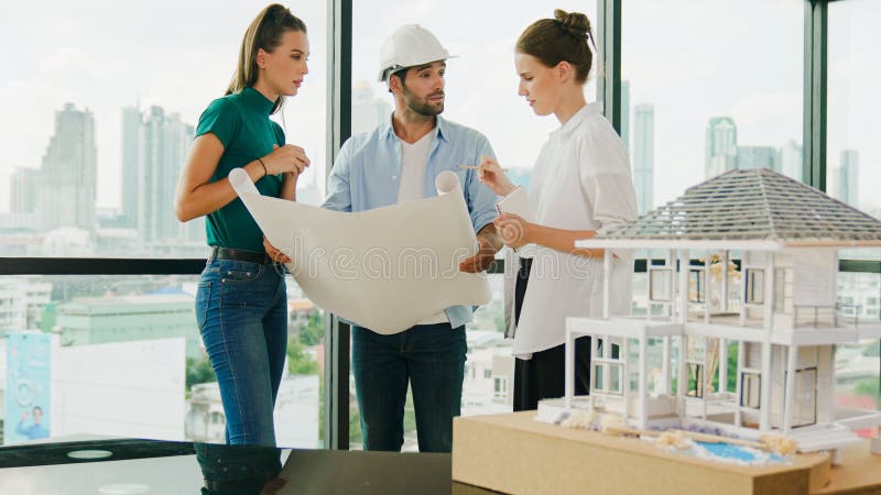 Engineer Team Talk about Design while Manager Hold at Project Plan ...