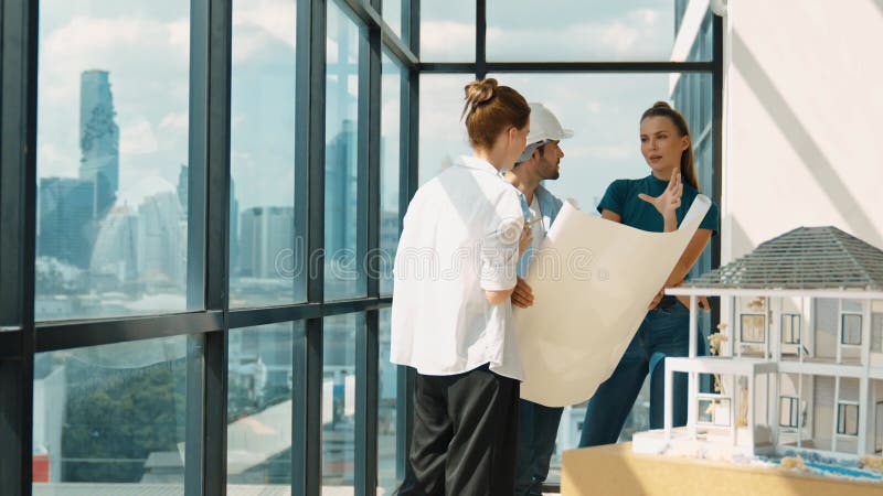 Engineer Team Talk about Design while Manager Hold at Project Plan ...