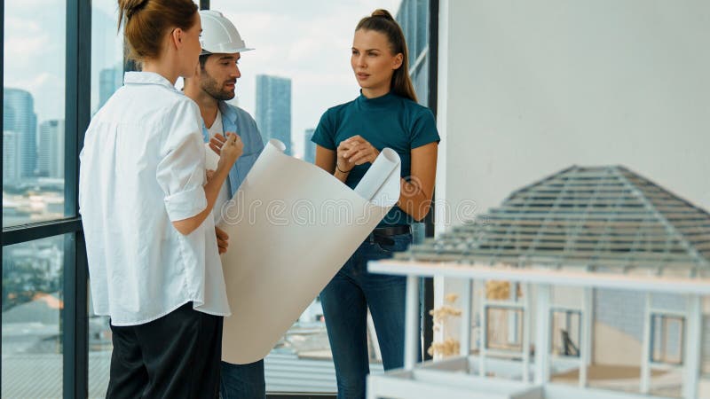 Engineer Team Talk about Design while Manager Hold at Project Plan ...