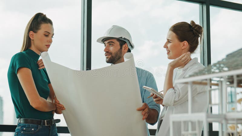 Engineer Team Talk about Design while Manager Hold at Project Plan ...