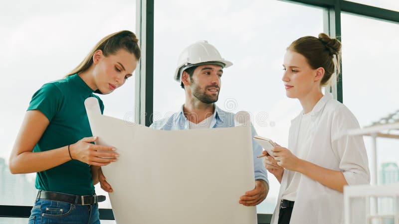 Engineer Team Talk about Design while Manager Hold at Project Plan ...