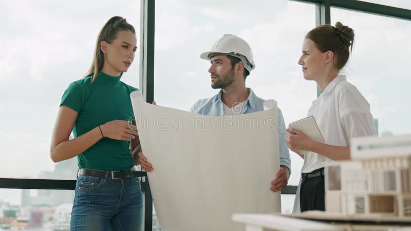 Engineer Team Thinking about Design while Looking at Project Plan ...