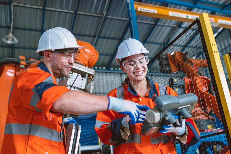 Engineer Team Worker Working Program Robot Arm Assembly Machine in ...