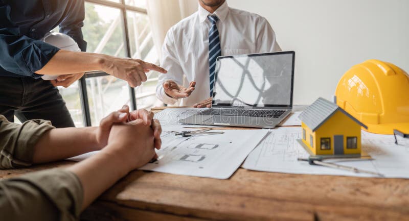 Engineer Team Working in Office with Blueprints, Inspection in ...