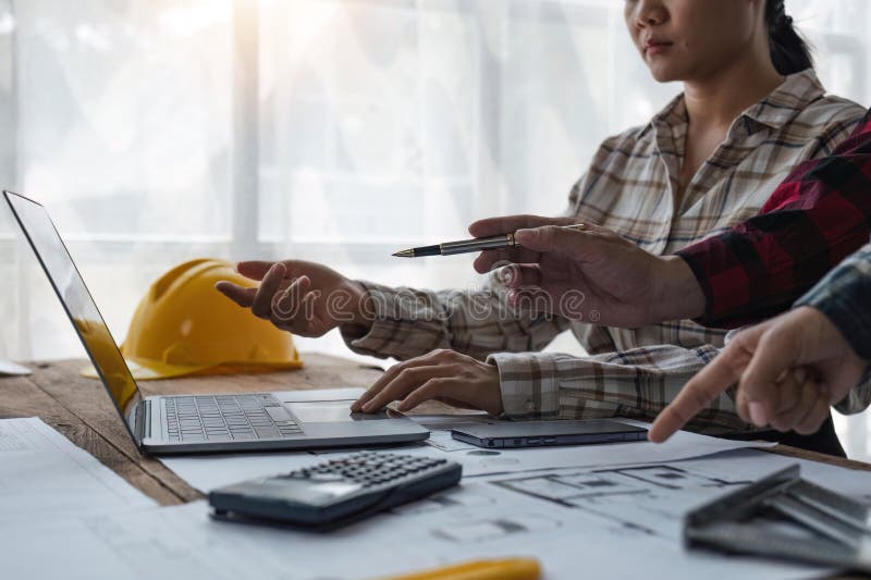 Engineer Team Working in Office with Blueprints, Inspection in ...