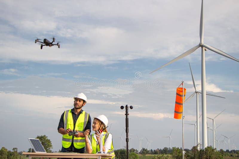 Engineer Team Working in Wind Turbine Farm. Renewable Energy with Wind ...