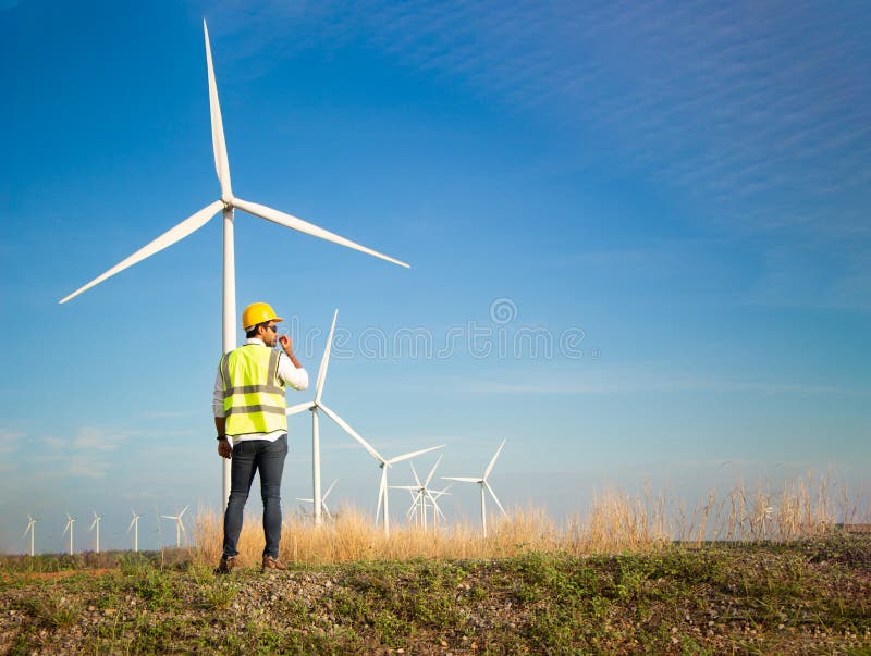Engineer Team Working in Wind Turbine Farm. Renewable Energy with Wind ...