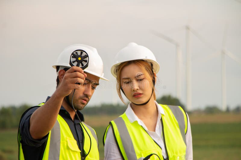 Engineer Team Working in Wind Turbine Farm. Renewable Energy with Wind ...