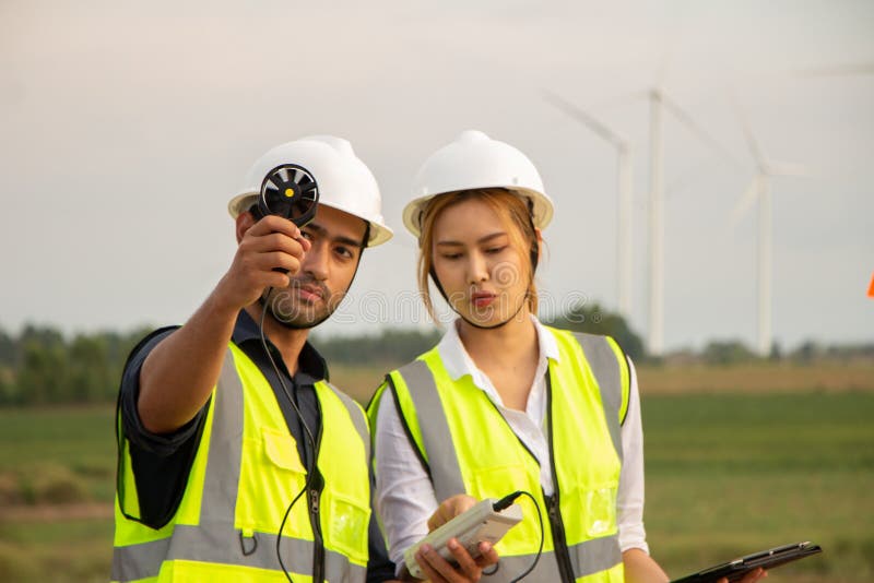 Engineer Team Working in Wind Turbine Farm. Renewable Energy with Wind ...
