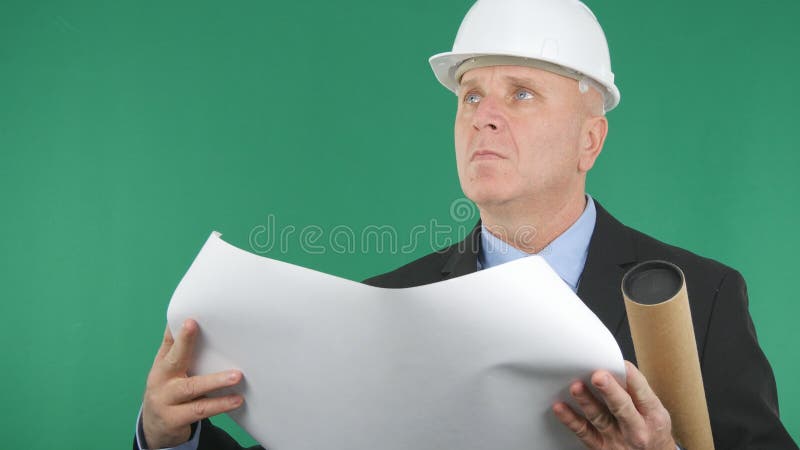 Engineer with Technical Project Open in Hands Looking Up Stock Image ...
