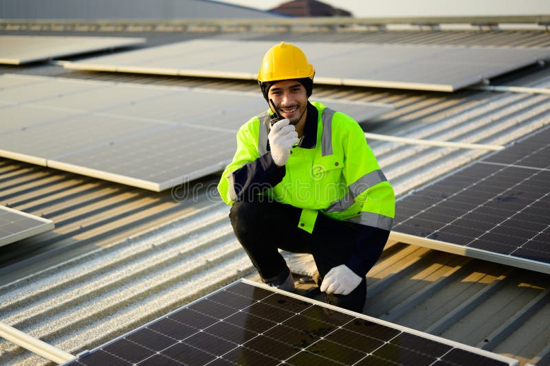 Engineer and Technician Checking and Operating Solar Panels Stock Photo ...