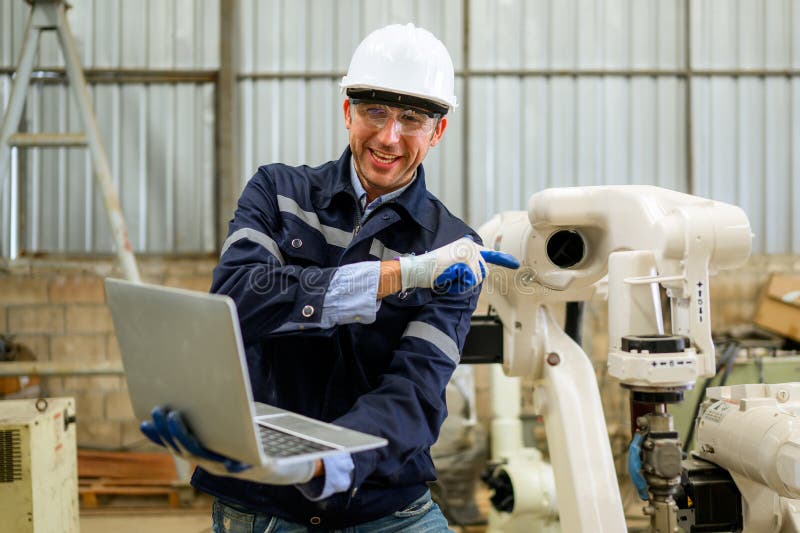 Engineer Technician Controlling Robotic Arms on Computer Laptop Stock ...