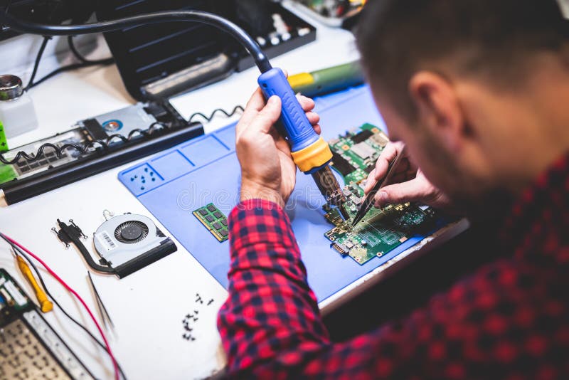 It Engineer Technician Repairing Computer in Electronics Service Shop ...