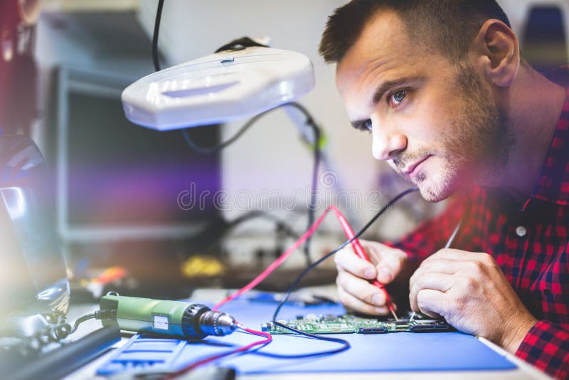 It Engineer Technician Repairing Computer in Electronics Service Shop ...