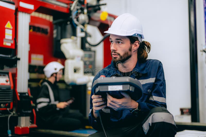 Engineer Technician Using Remote Controller Controlling Machinery Stock ...