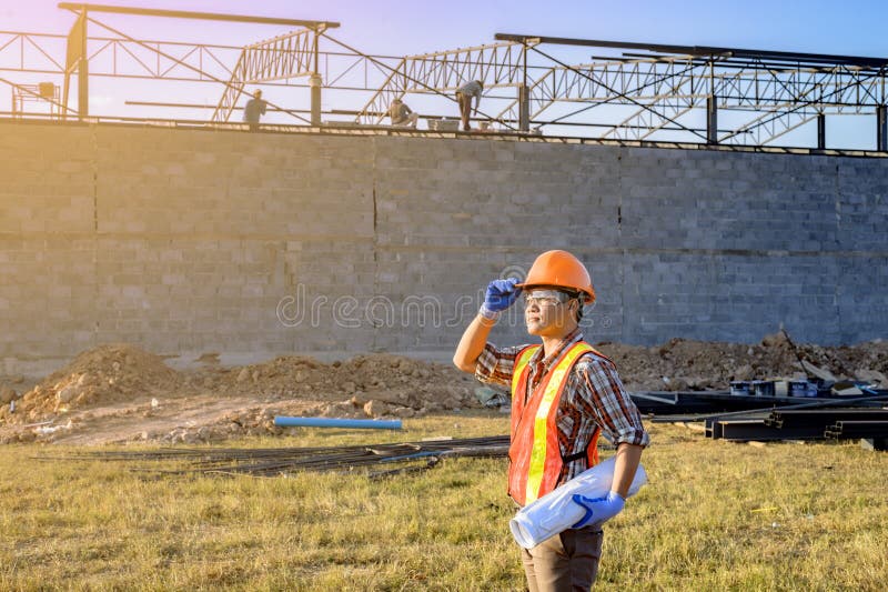 Engineer Technician Watching Team of Workers on High Steel Platform ...