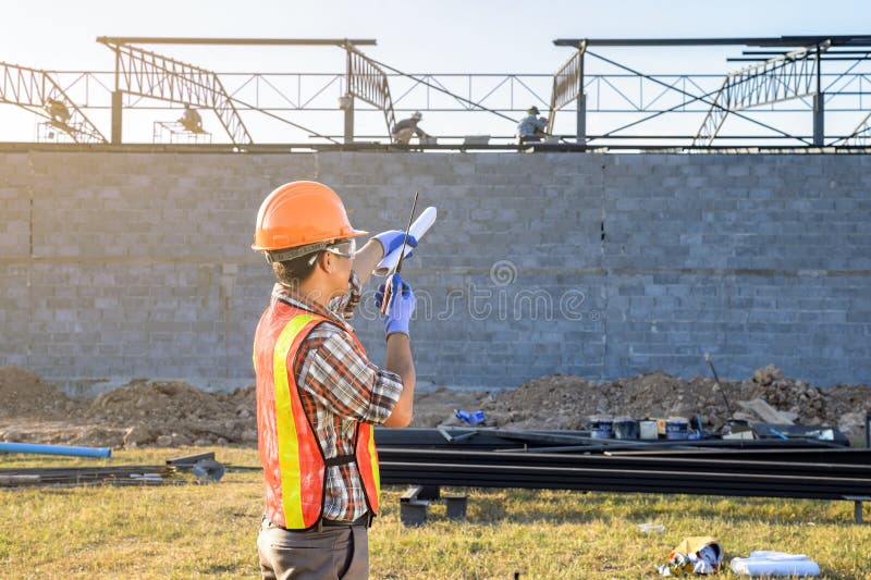 Engineer Technician Watching Team of Workers on High Steel Platform ...