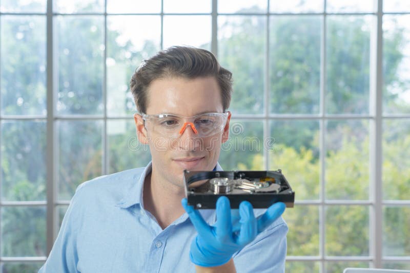 An Engineer or Technician Western Man Working, Examining or Repairing ...