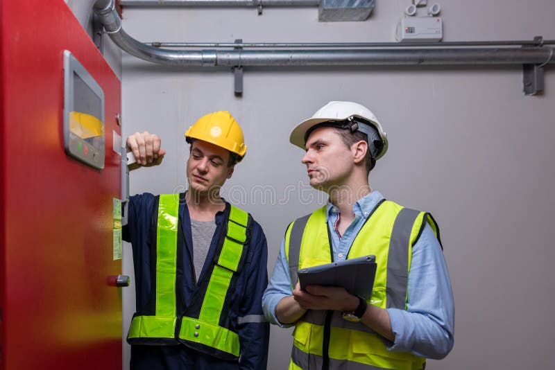 Engineer or Technician Work Checking Fire Suppression System and Fire ...
