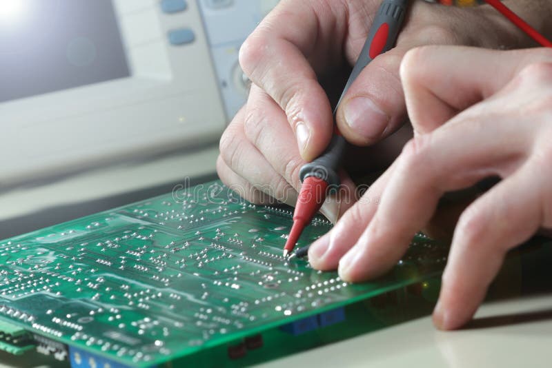 Engineer Test Electronic Component with Oscilloscope Stock Image ...