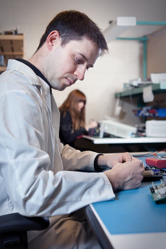 Engineer Testing a Circuit Board Assembly Stock Photo - Image of meter ...