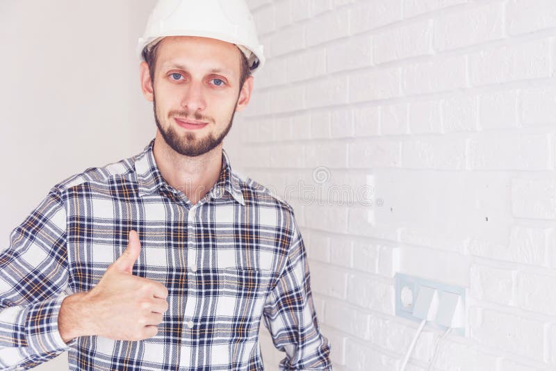 Engineer Thumb Up while Holding Helmet and Tablet on White Background ...