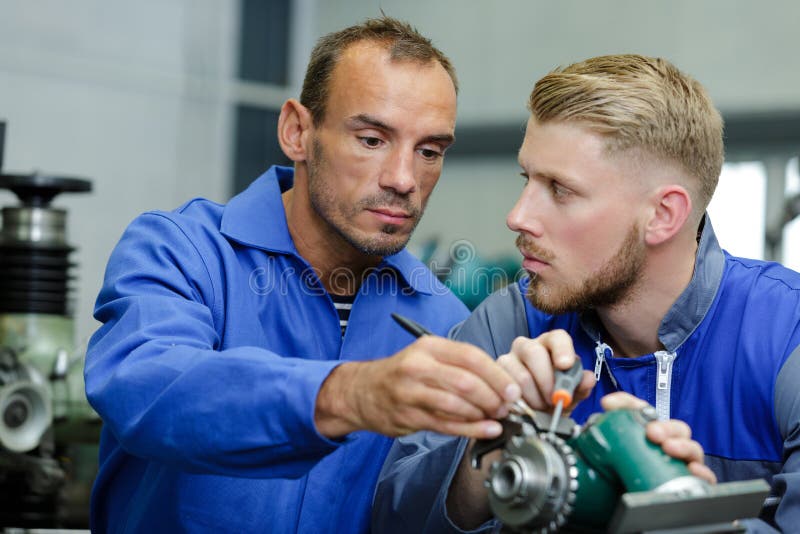 Engineer Training Apprentice on Cnc Machine Stock Photo - Image of ...