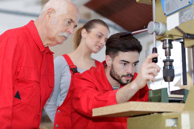 Engineer Training Female Apprentice on Milling Machine Stock Photo ...