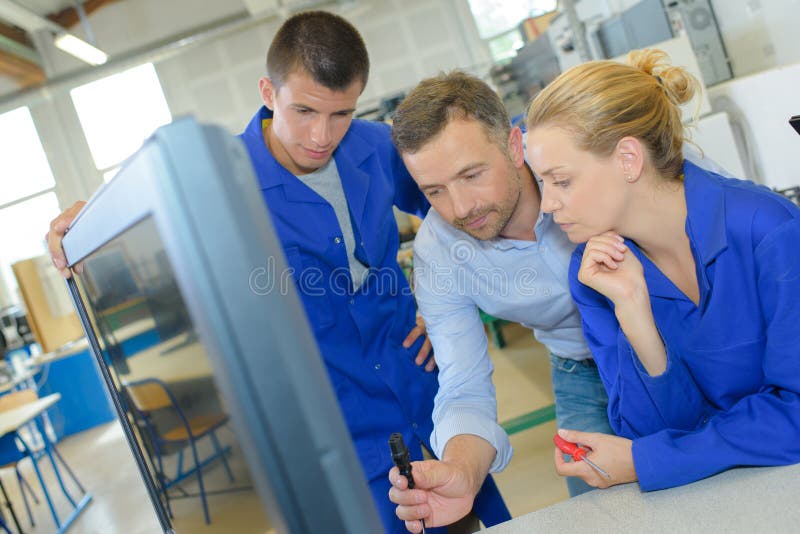 Engineer Training Female and Male Apprentice Stock Image - Image of ...