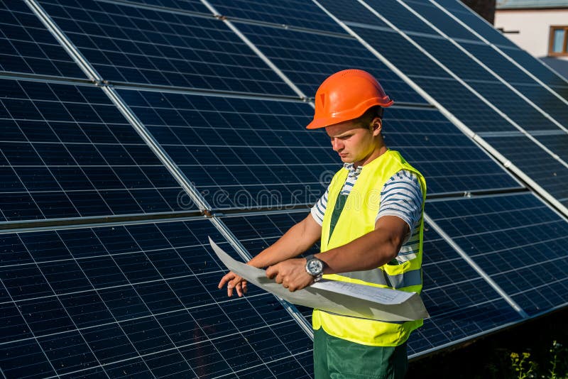Engineer in Uniform Working of Solar Power Plant Stock Image - Image of ...