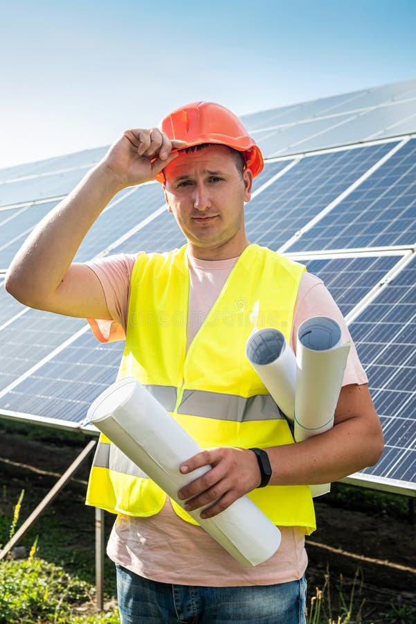 Engineer in Uniform Working of Solar Power Plant Stock Photo - Image of ...